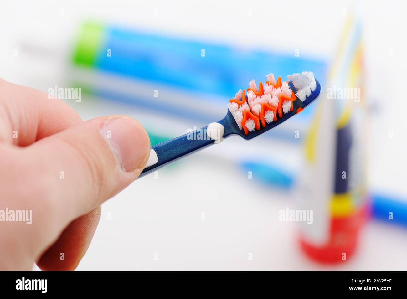 Striped toothpaste on tooth-brush Stock Photo - Alamy