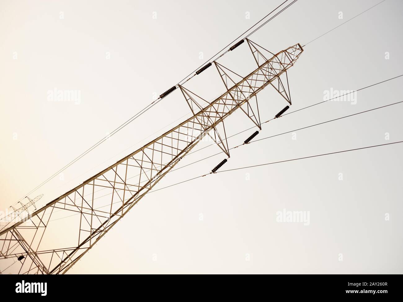 Wires of electricity transmissions last from support Stock Photo - Alamy