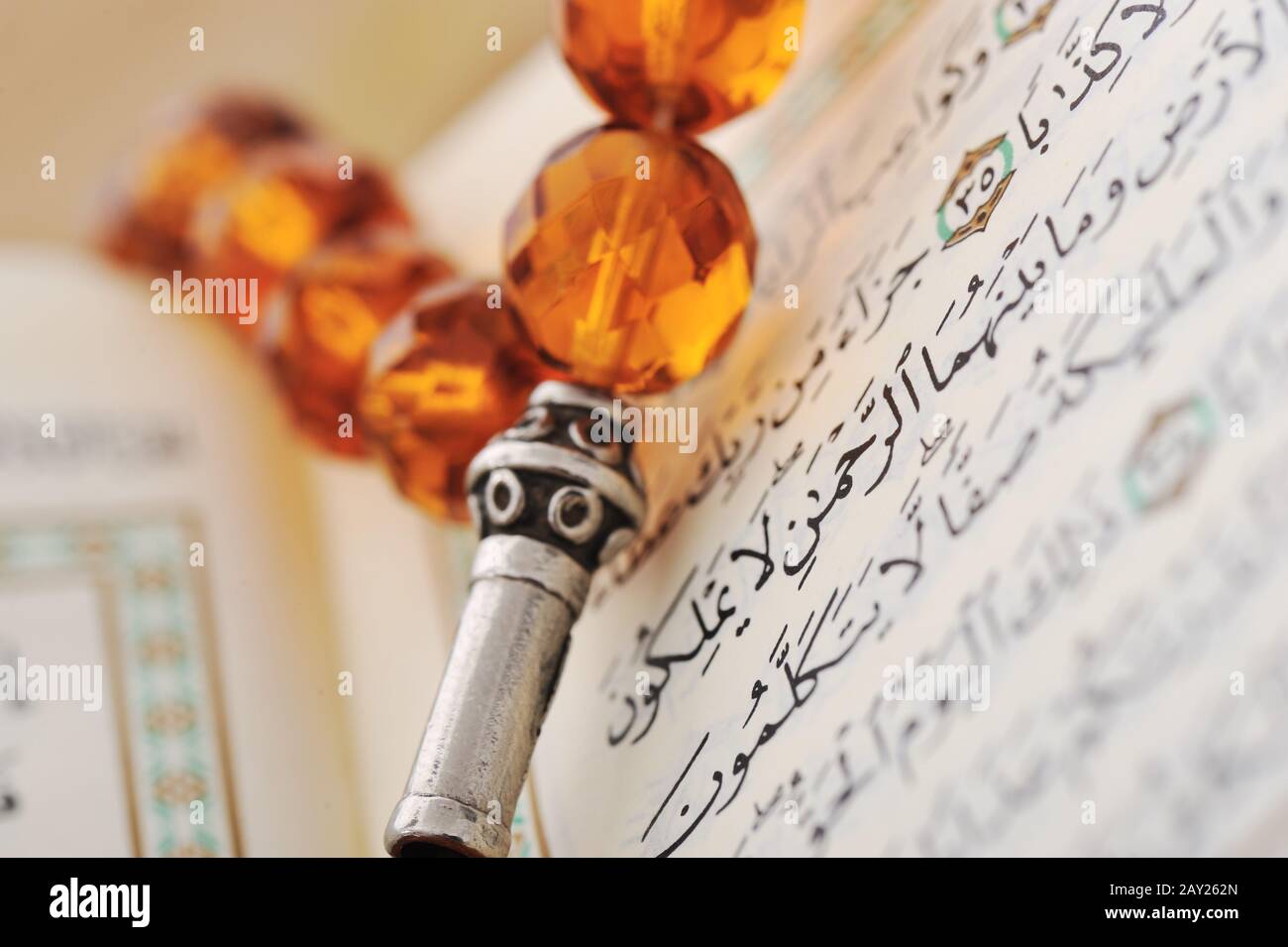 Rosary and Qoran Stock Photo - Alamy