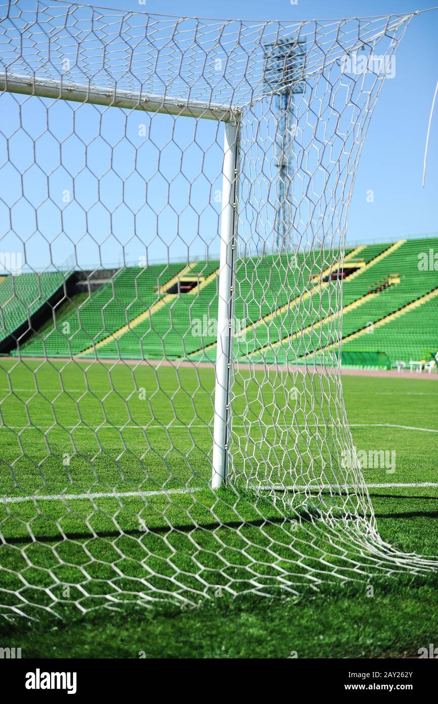 goal net and white line in a soccer field on stadium Stock Photo - Alamy