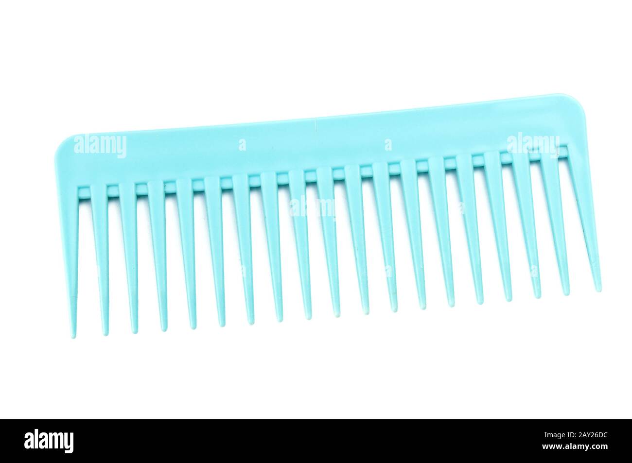 Blue comb isolated on the white background Stock Photo - Alamy