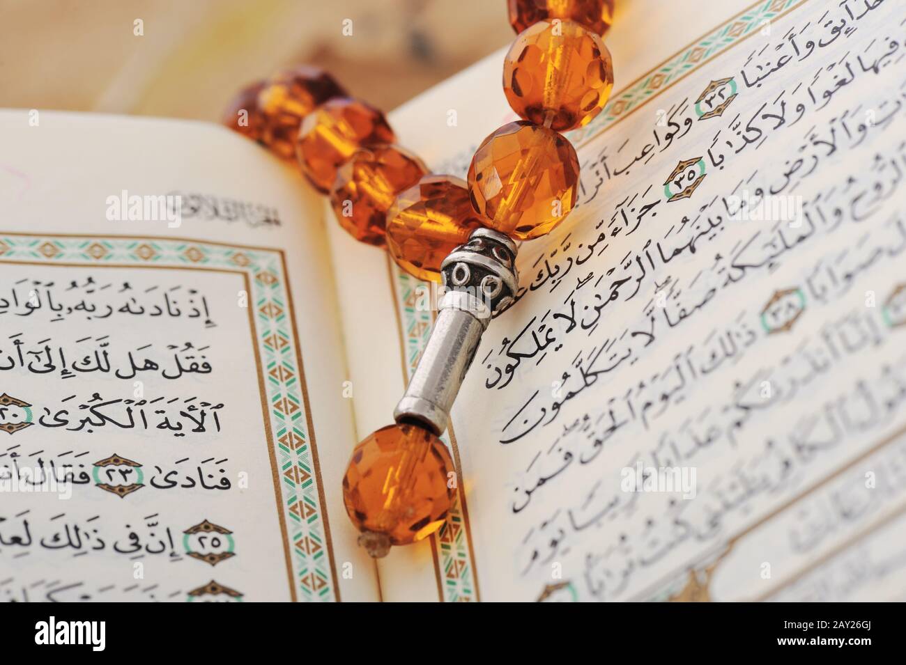 Rosary and Qoran Stock Photo - Alamy
