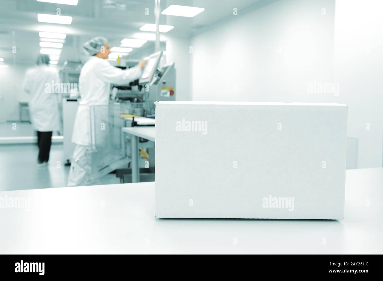 White box at automated production line at modern factory Stock Photo ...