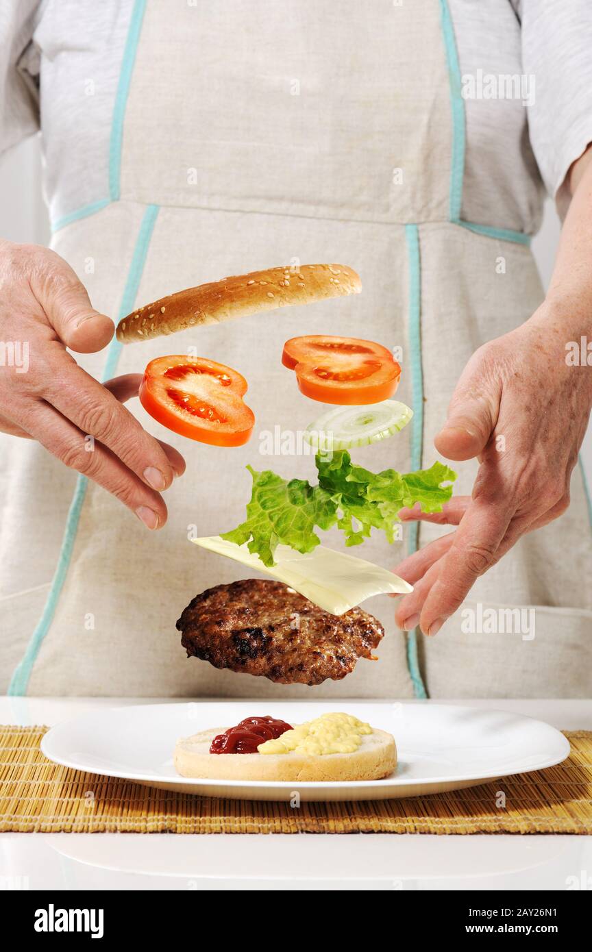 Making hamburger ingredients concept Stock Photo - Alamy