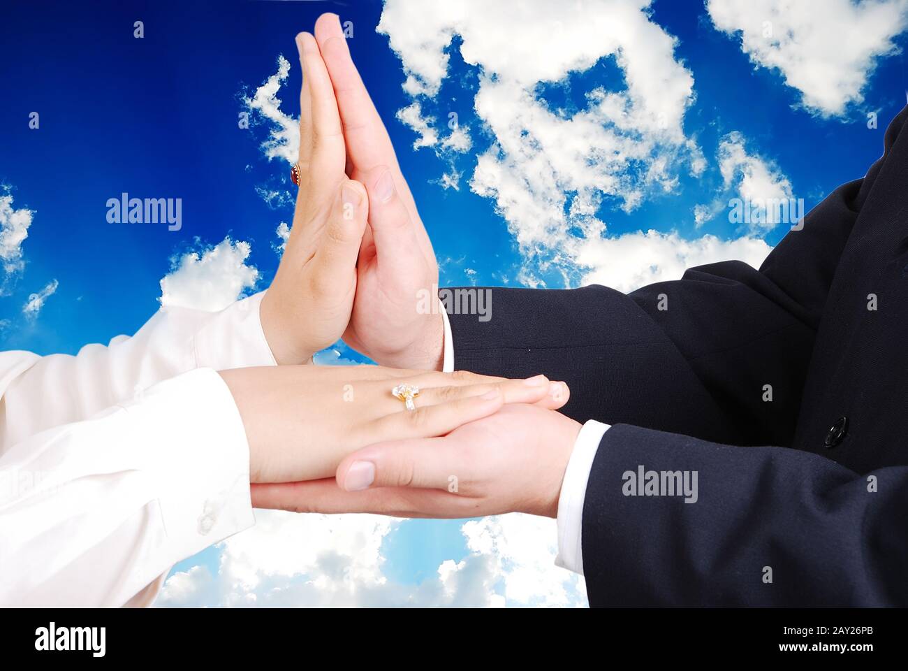 Connected hands of two young lovers Stock Photo - Alamy