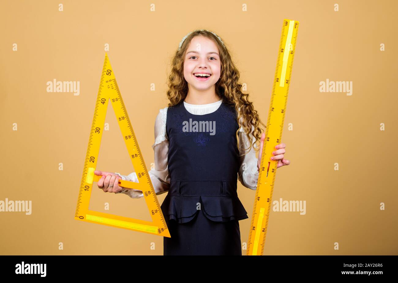 School student learning geometry. small girl back to school. STEM ...