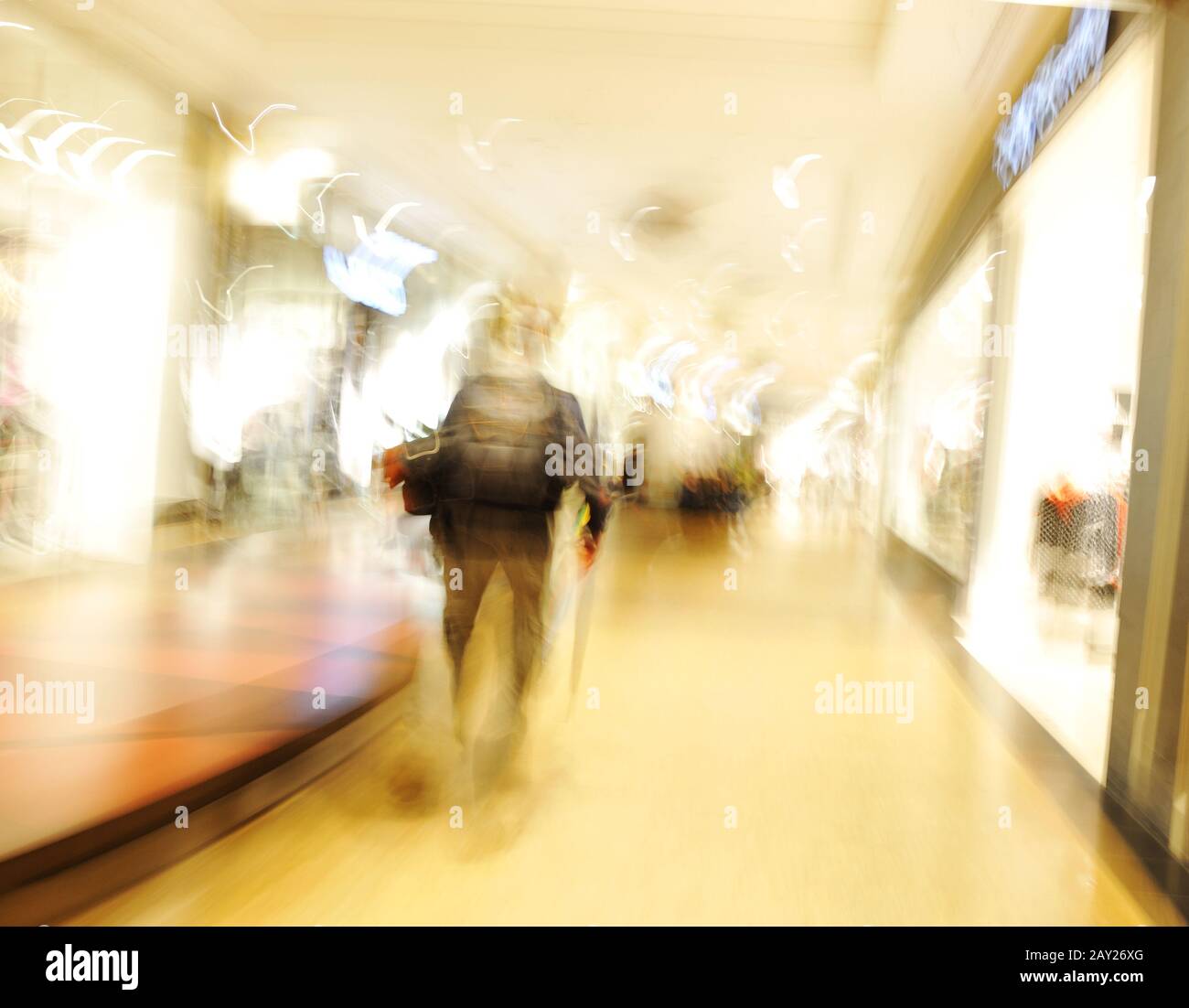 People crowd motion at shopping mall Stock Photo - Alamy