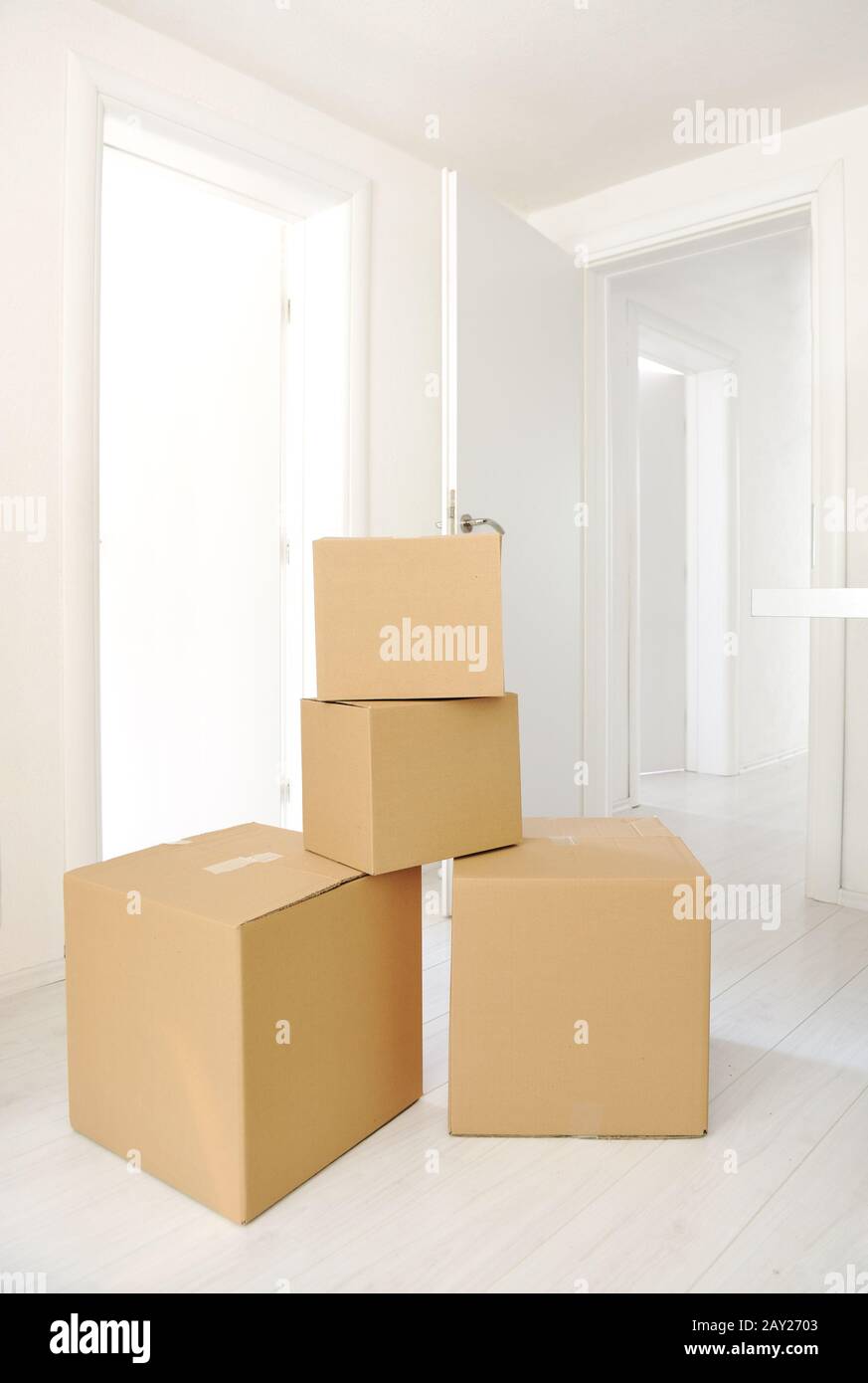 Moving Boxes at new home Stock Photo - Alamy