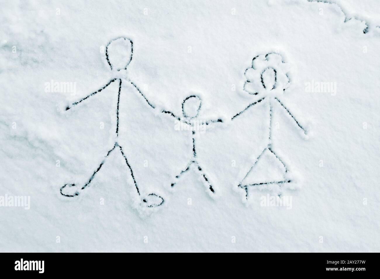 Drawing of family on snow Stock Photo - Alamy