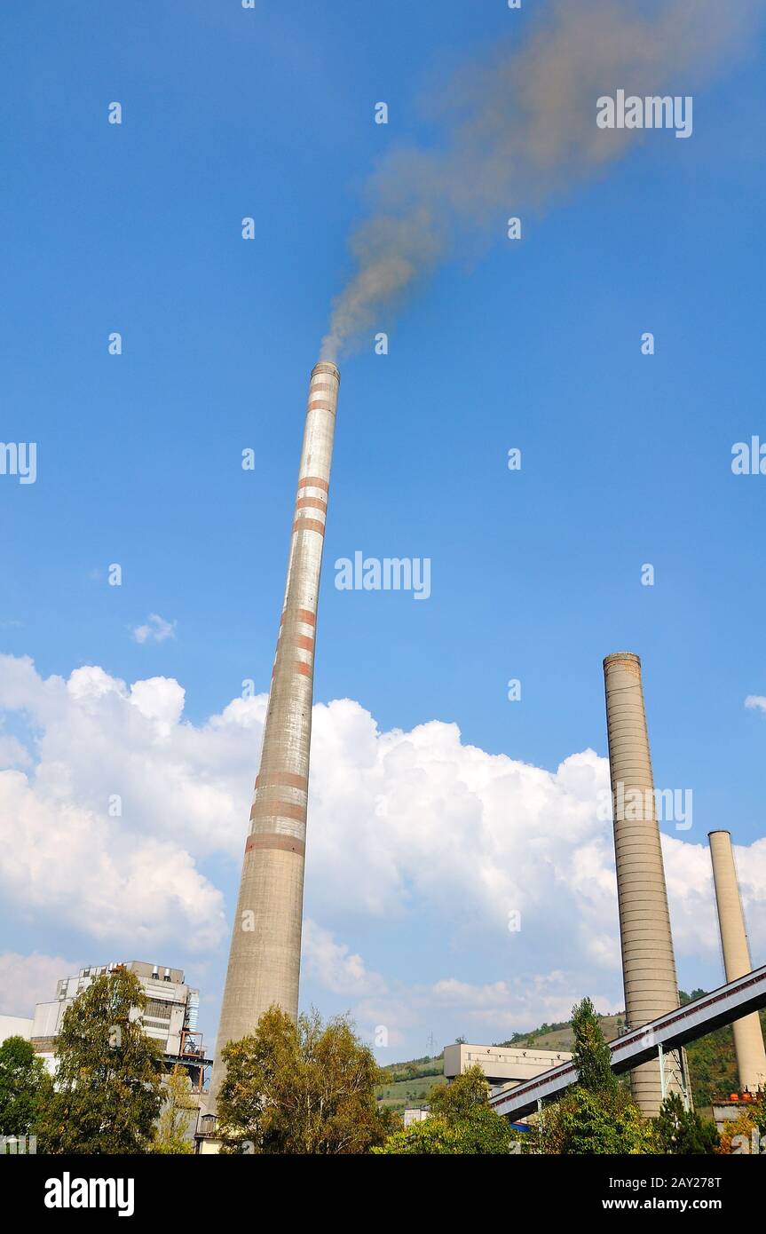 Two large industrial chimneys hi-res stock photography and images - Alamy
