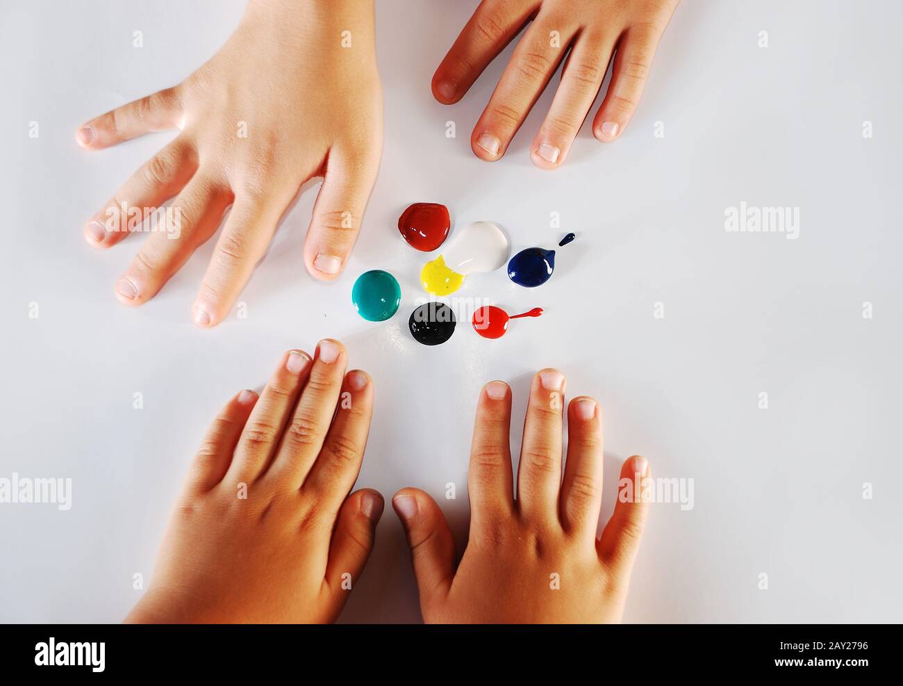 Children little hands playing with colors on white background Stock ...