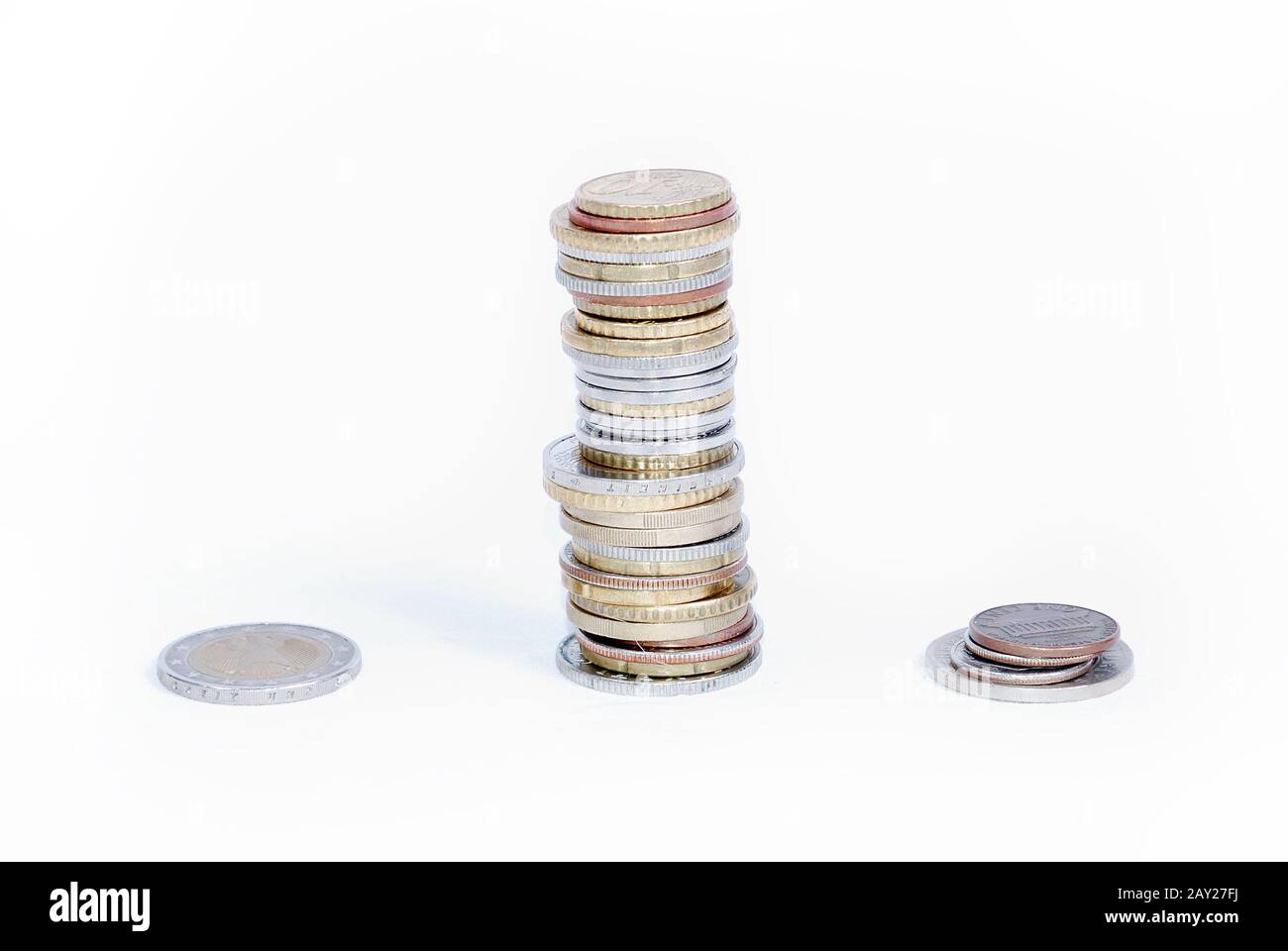 Many coins in one place isolated Stock Photo - Alamy