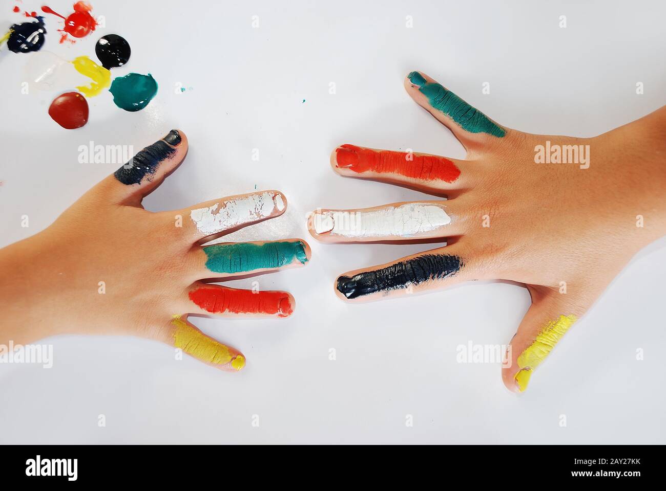 Children little hands playing with colors on white background Stock ...