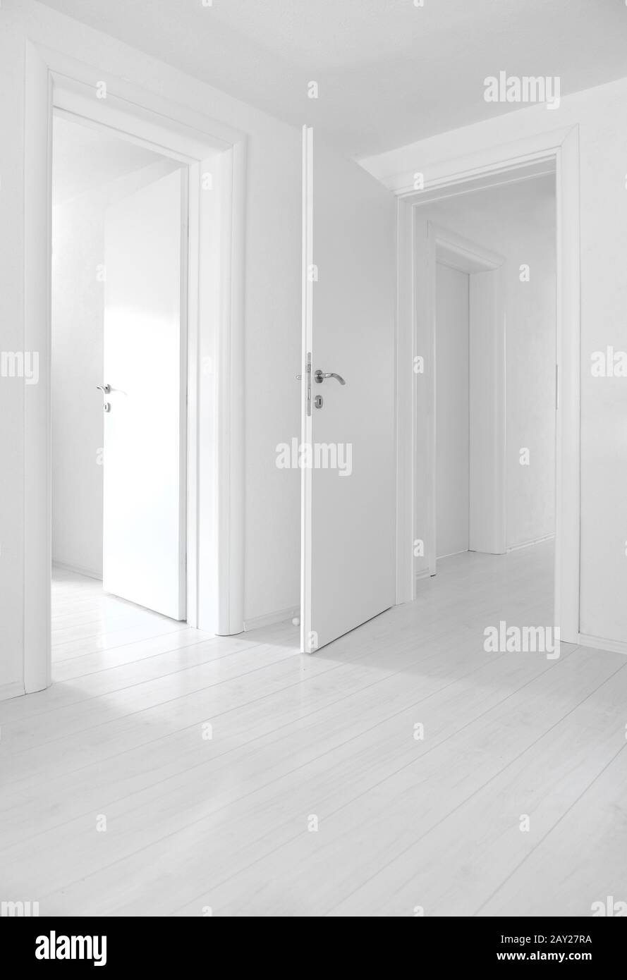 Empty home interior doors and floor Stock Photo - Alamy