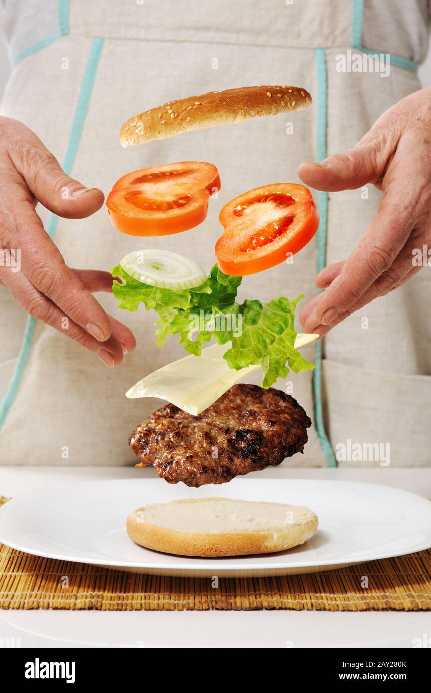Woman making sandwich cheese tomato hi-res stock photography and images ...