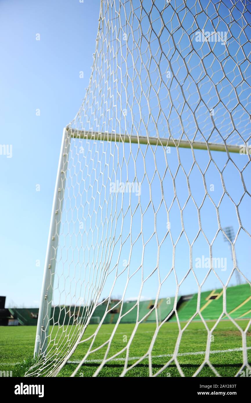 goal net and white line in a soccer field on stadium Stock Photo - Alamy