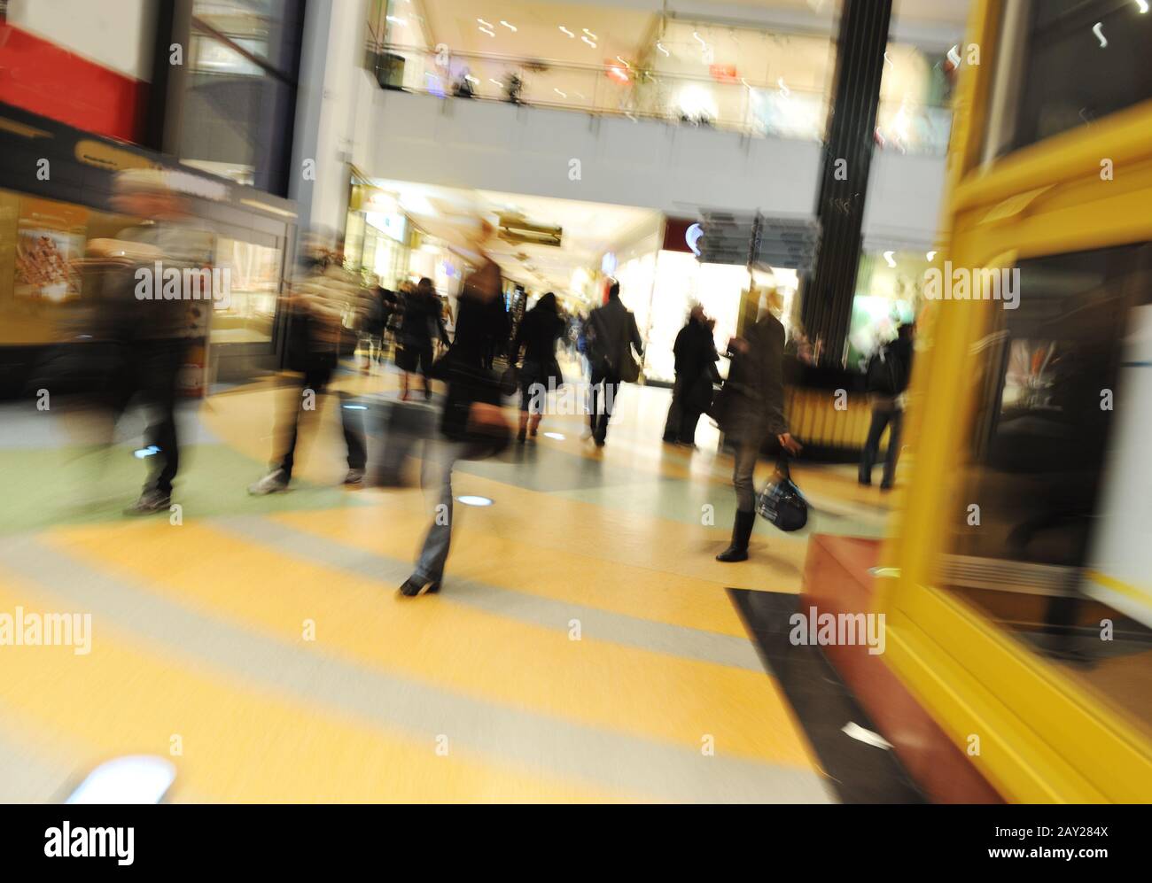 People crowd motion at shopping mall Stock Photo - Alamy