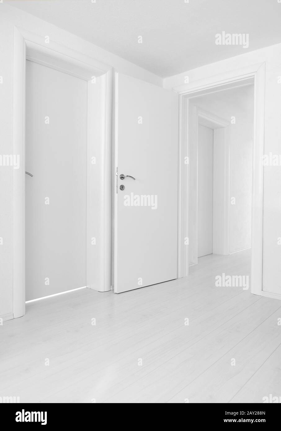 Empty home interior doors and floor Stock Photo - Alamy