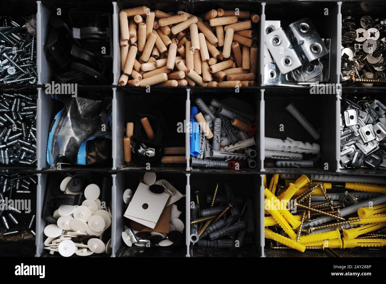 Toolbox with arranged screws and small pieces equipment Stock Photo - Alamy