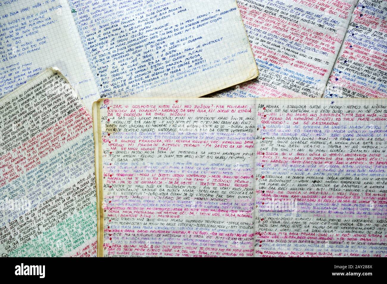 Handwriting colorful notebooks Stock Photo - Alamy
