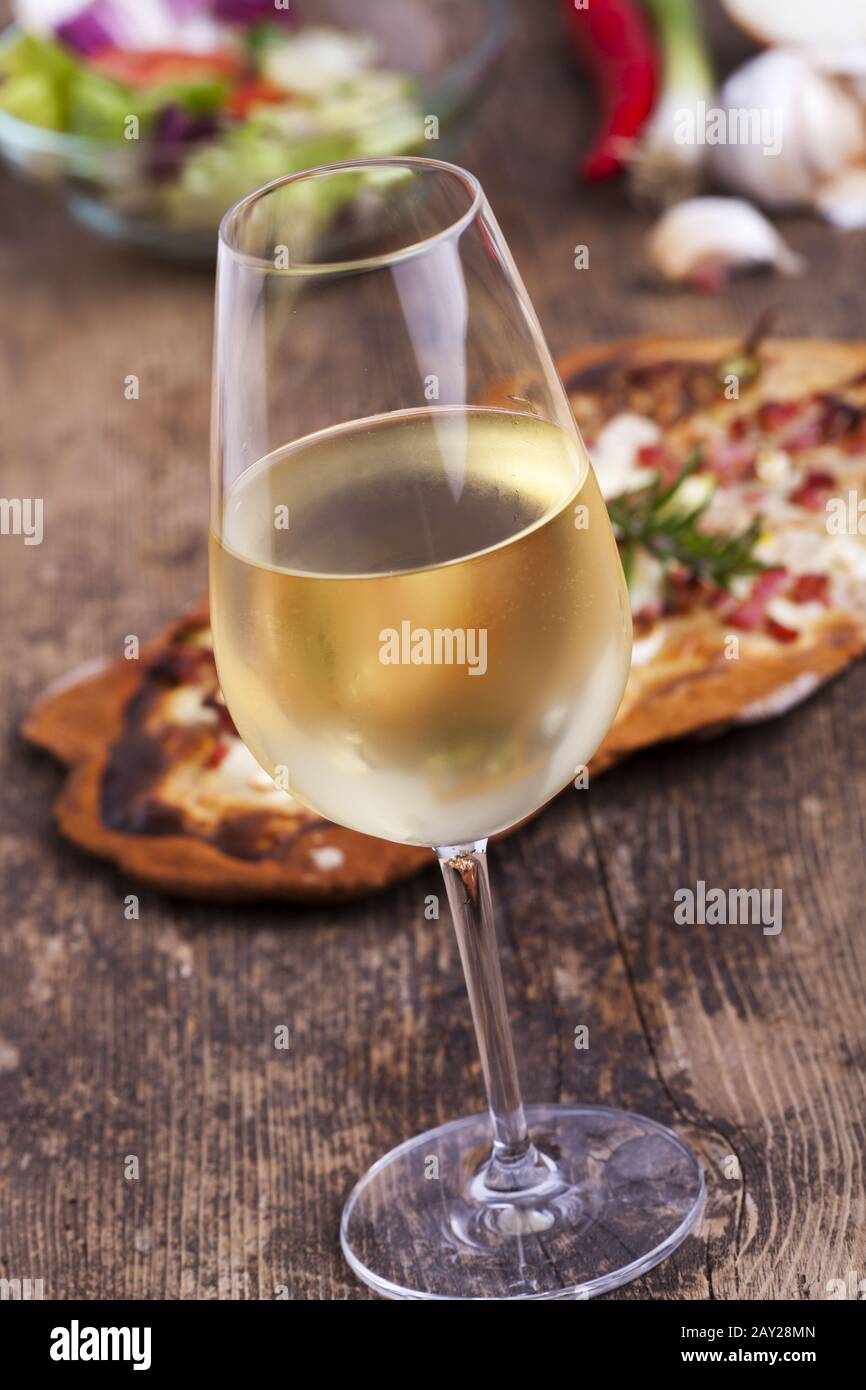 White wine and tarte flambée Stock Photo - Alamy