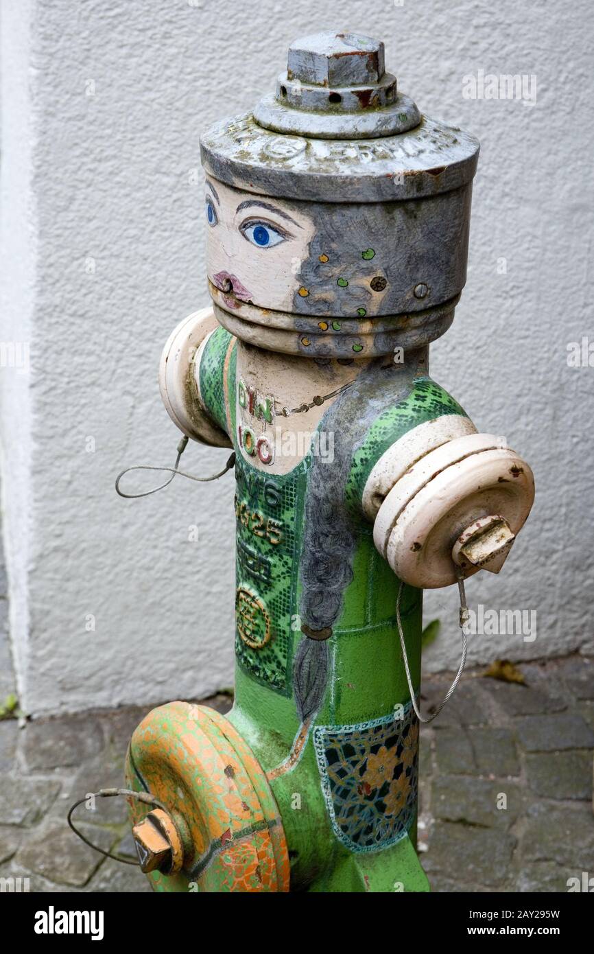 colorfully painted hydrant Stock Photo - Alamy