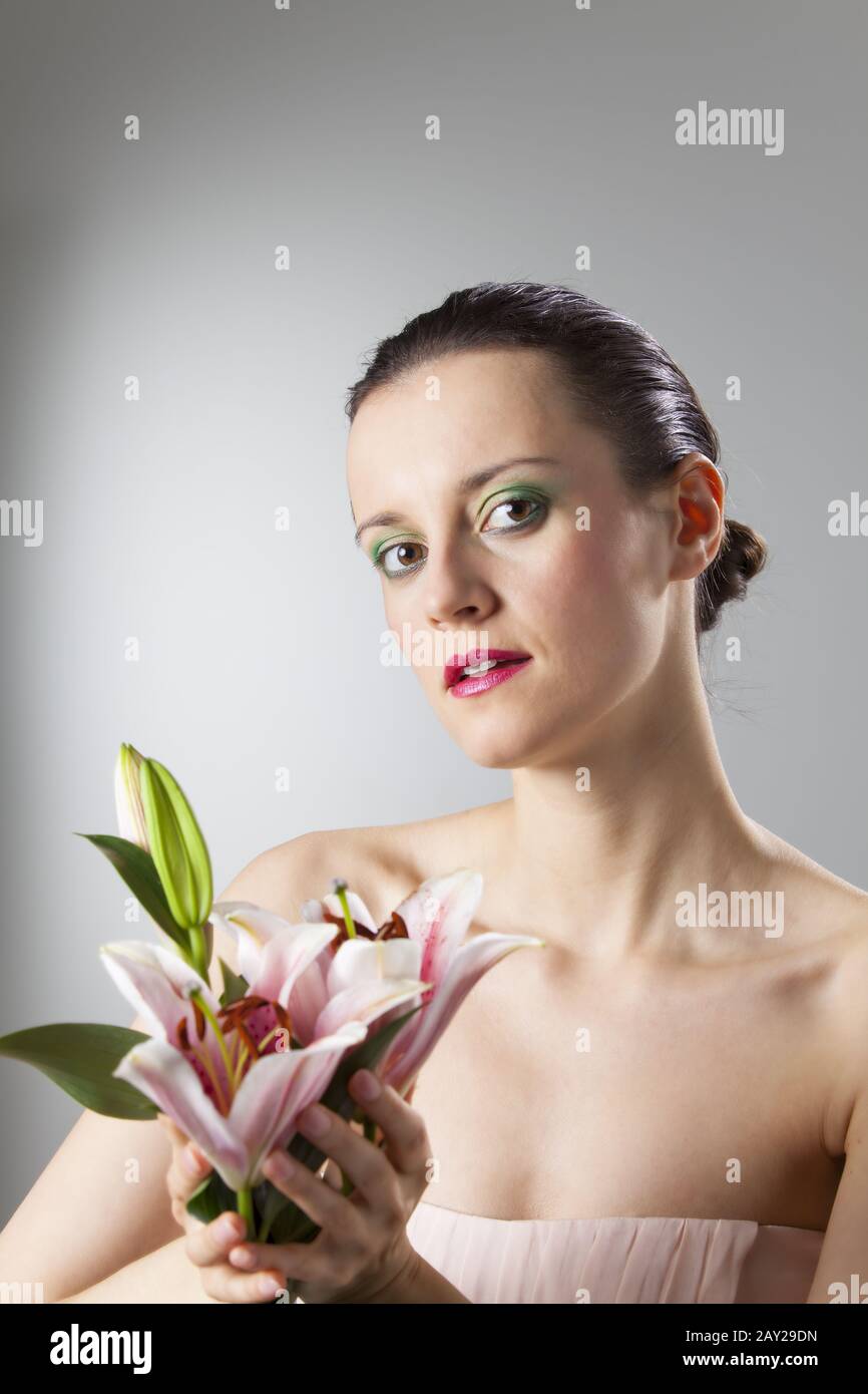 Hand Holding Lily Stock Photos & Hand Holding Lily Stock Images - Alamy