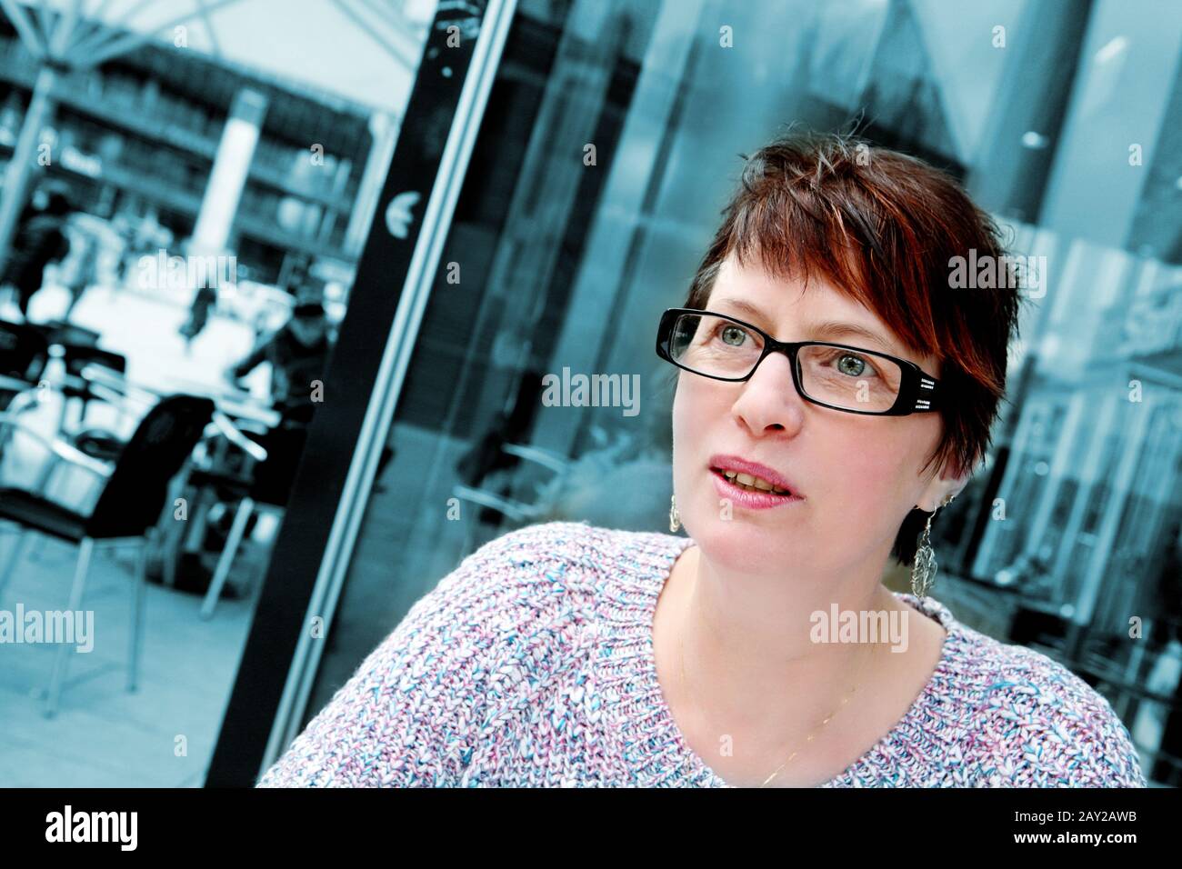 Woman around hi-res stock photography and images - Alamy