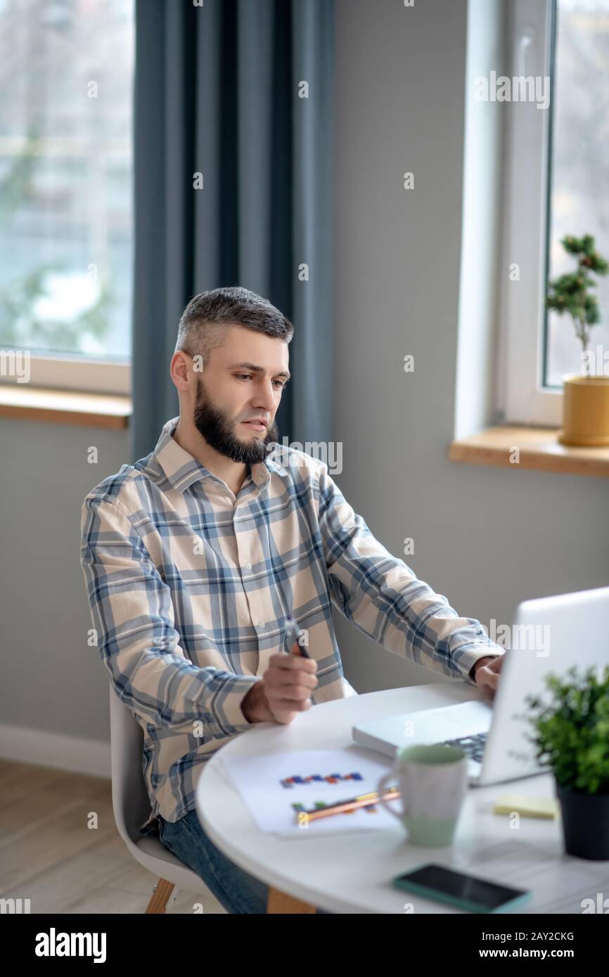 Young man distracted hi-res stock photography and images - Alamy
