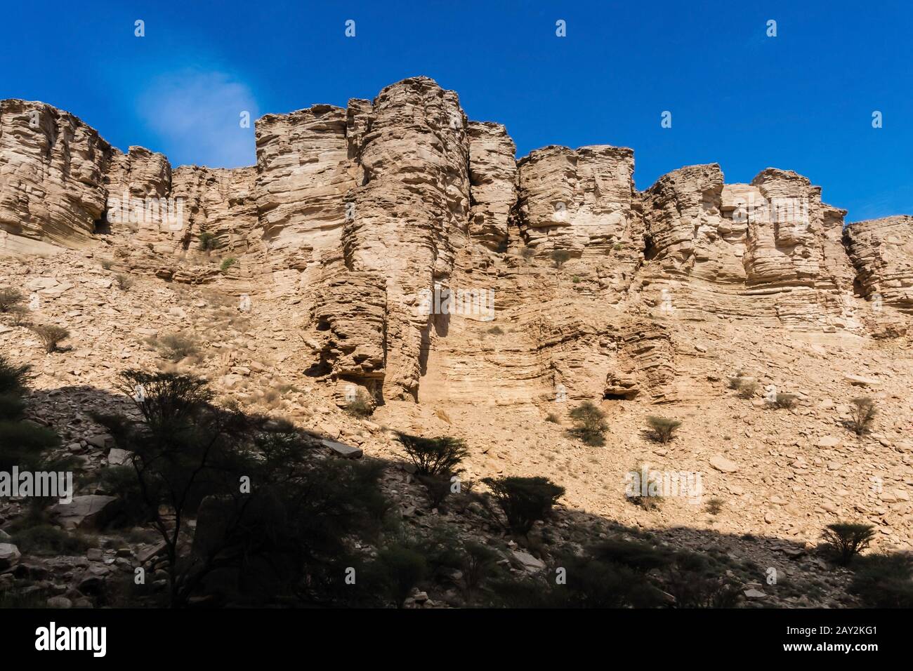 A rock cliff in the Sha'ib Luha valley south of Riyadh, Saudi Arabia ...