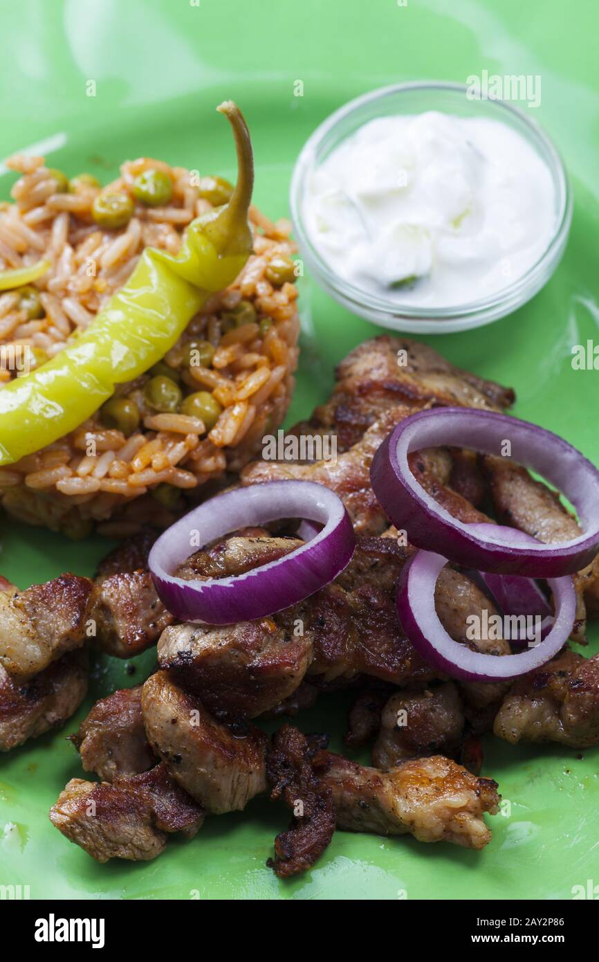 Greek gyros on a plate Stock Photo - Alamy