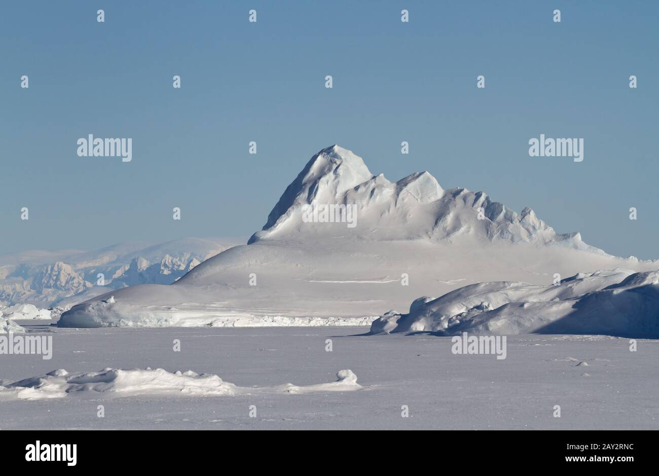 Pyramid prominent iceberg frozen in winter Antarctic waters Stock Photo ...