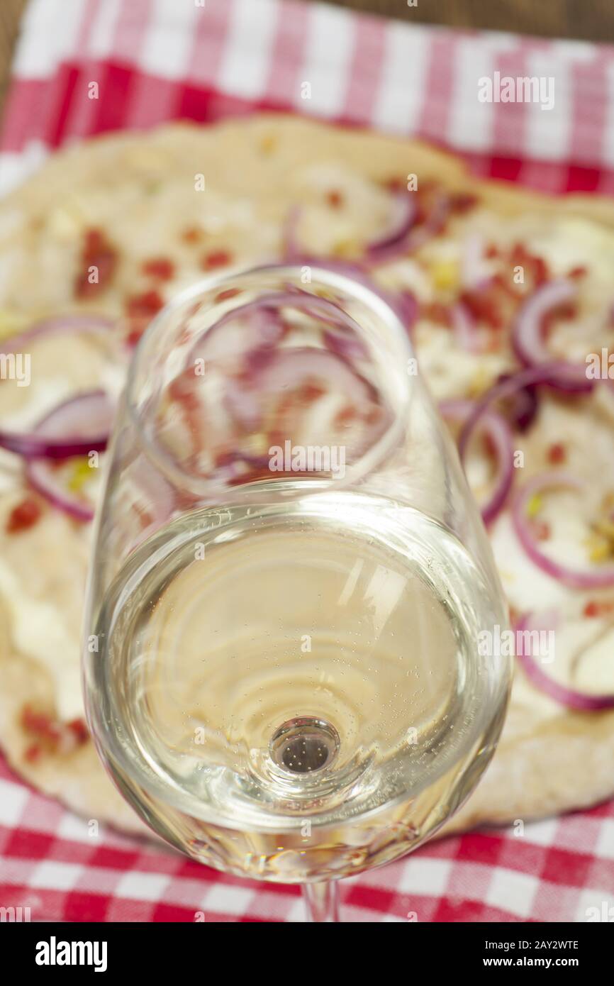French tarte flambée with white wine Stock Photo - Alamy