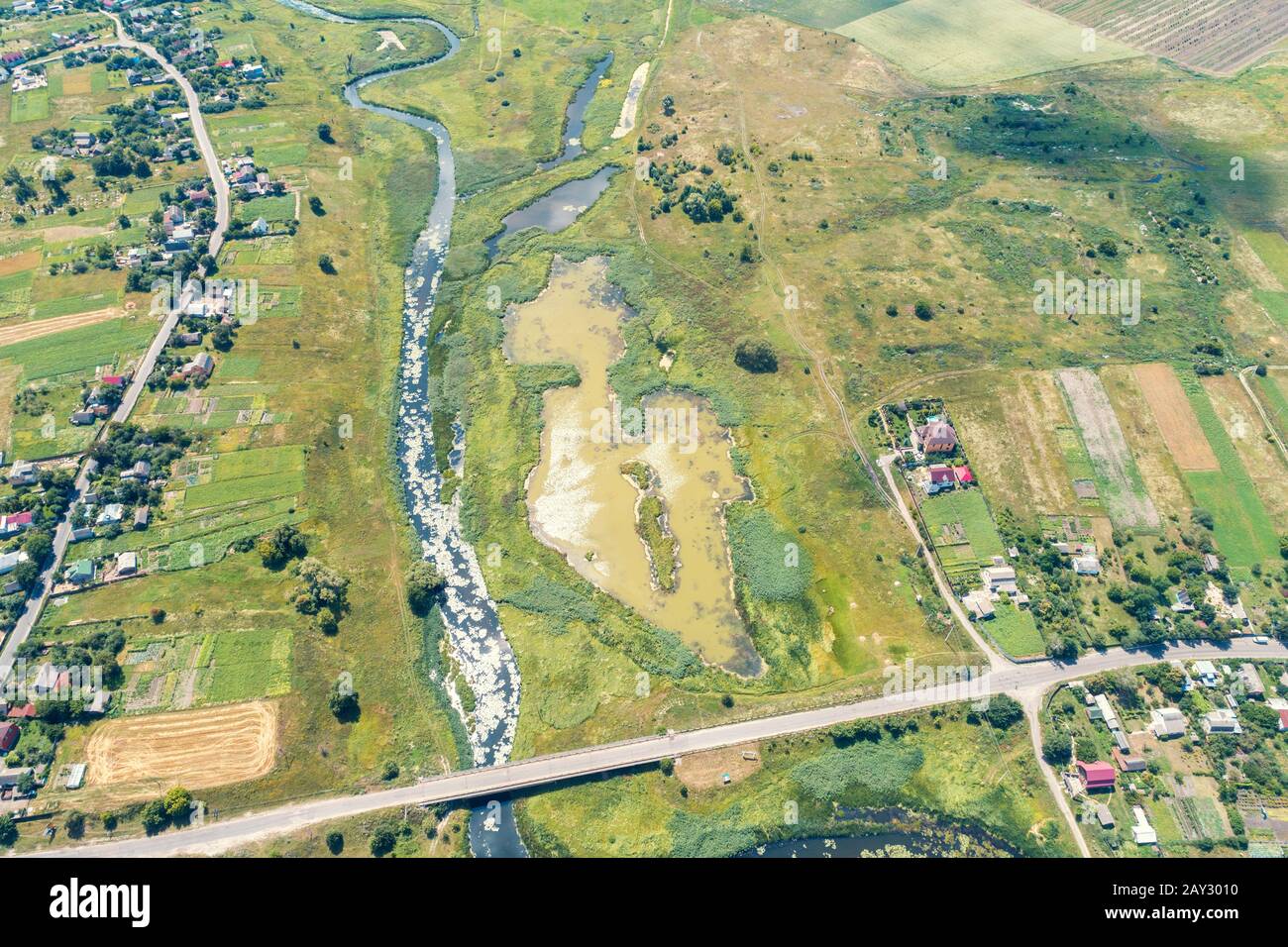 Summer rural landscape. Aerial view. View of village, river, green ...