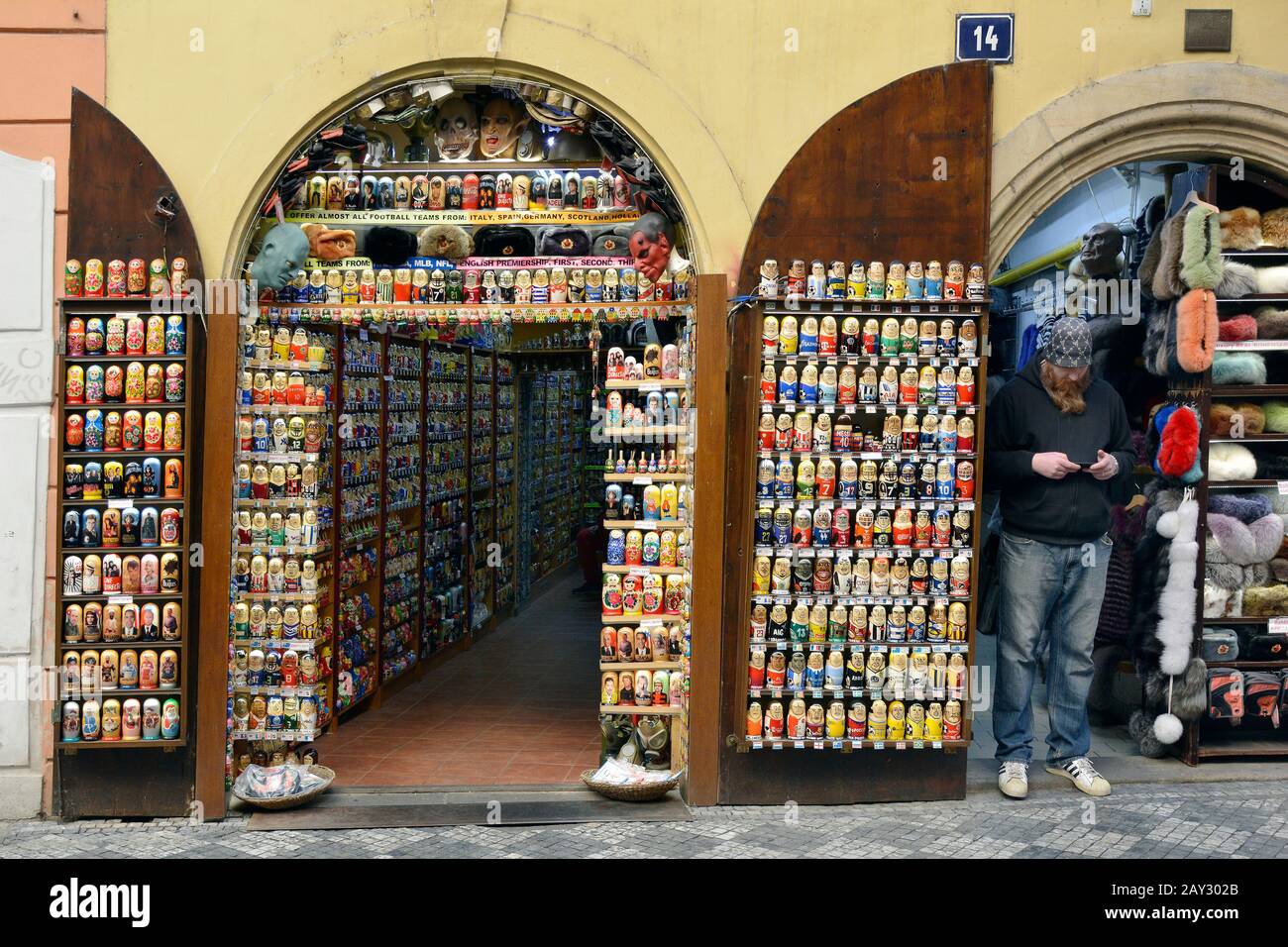 Prague, Czech Republic - December 3rd 2015: Unidentified man and shop ...