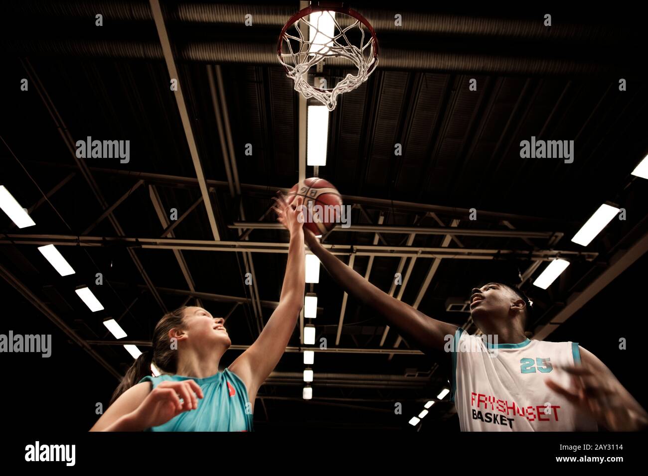 Two people playing basketball hi-res stock photography and images - Alamy