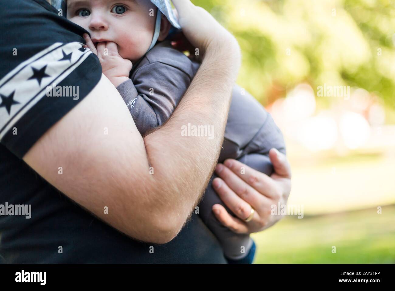 Father carry baby Stock Photo - Alamy
