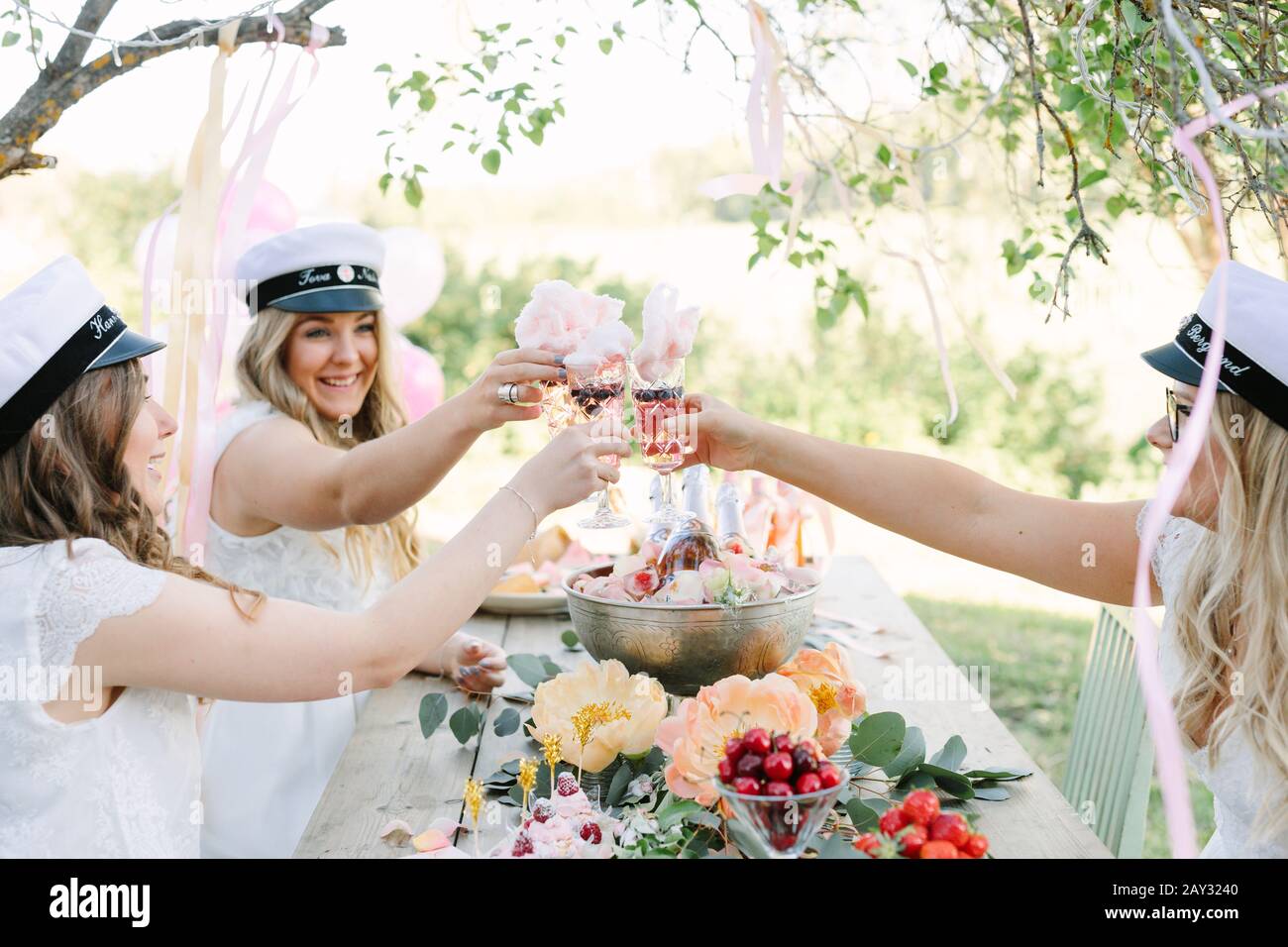 Women celebrating graduation Stock Photo - Alamy