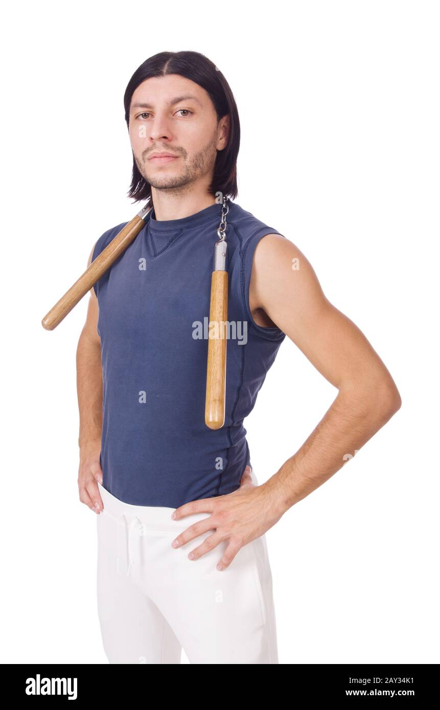 Funny karate fighter with nunchucks on white Stock Photo - Alamy