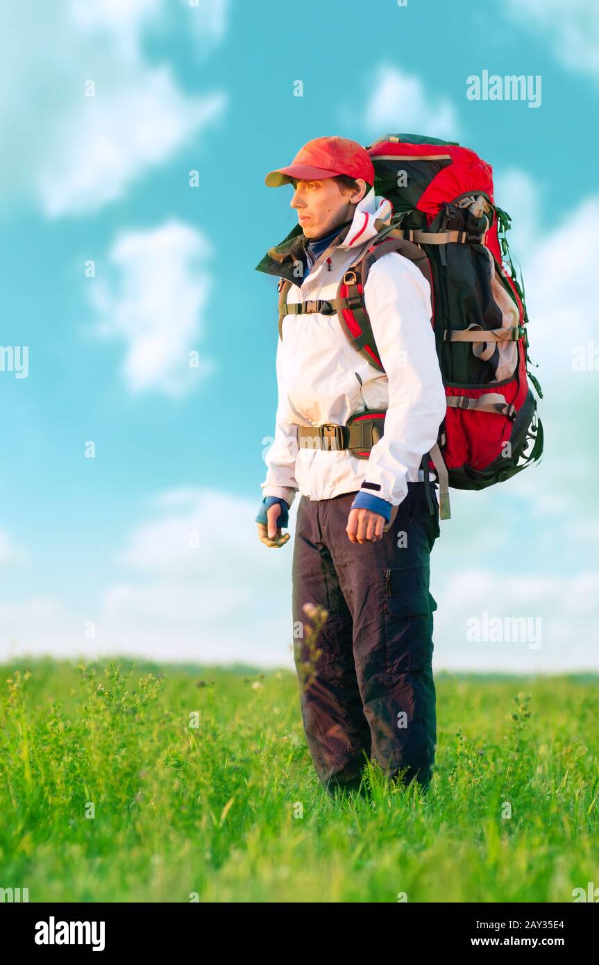 Backpack in mountain field hi-res stock photography and images - Alamy