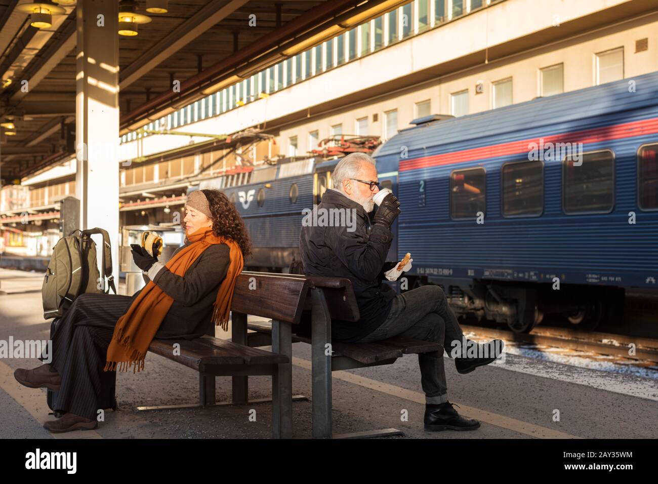 Two people on platform hi-res stock photography and images - Alamy