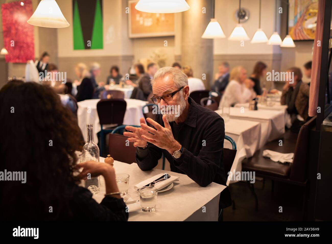 Man in restaurant Stock Photo - Alamy