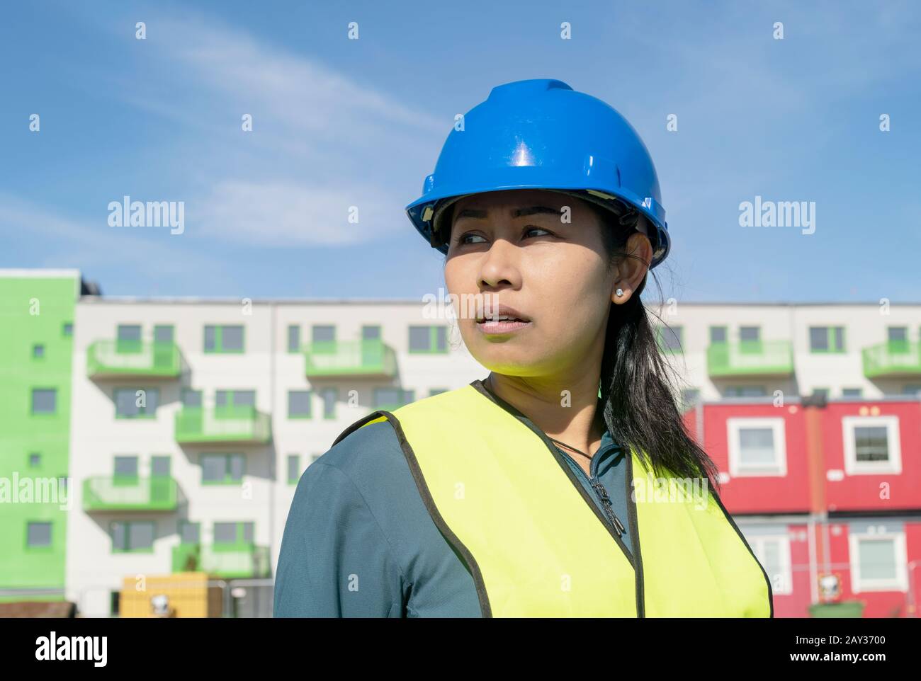 Woman protective clothing construction hi-res stock photography and ...