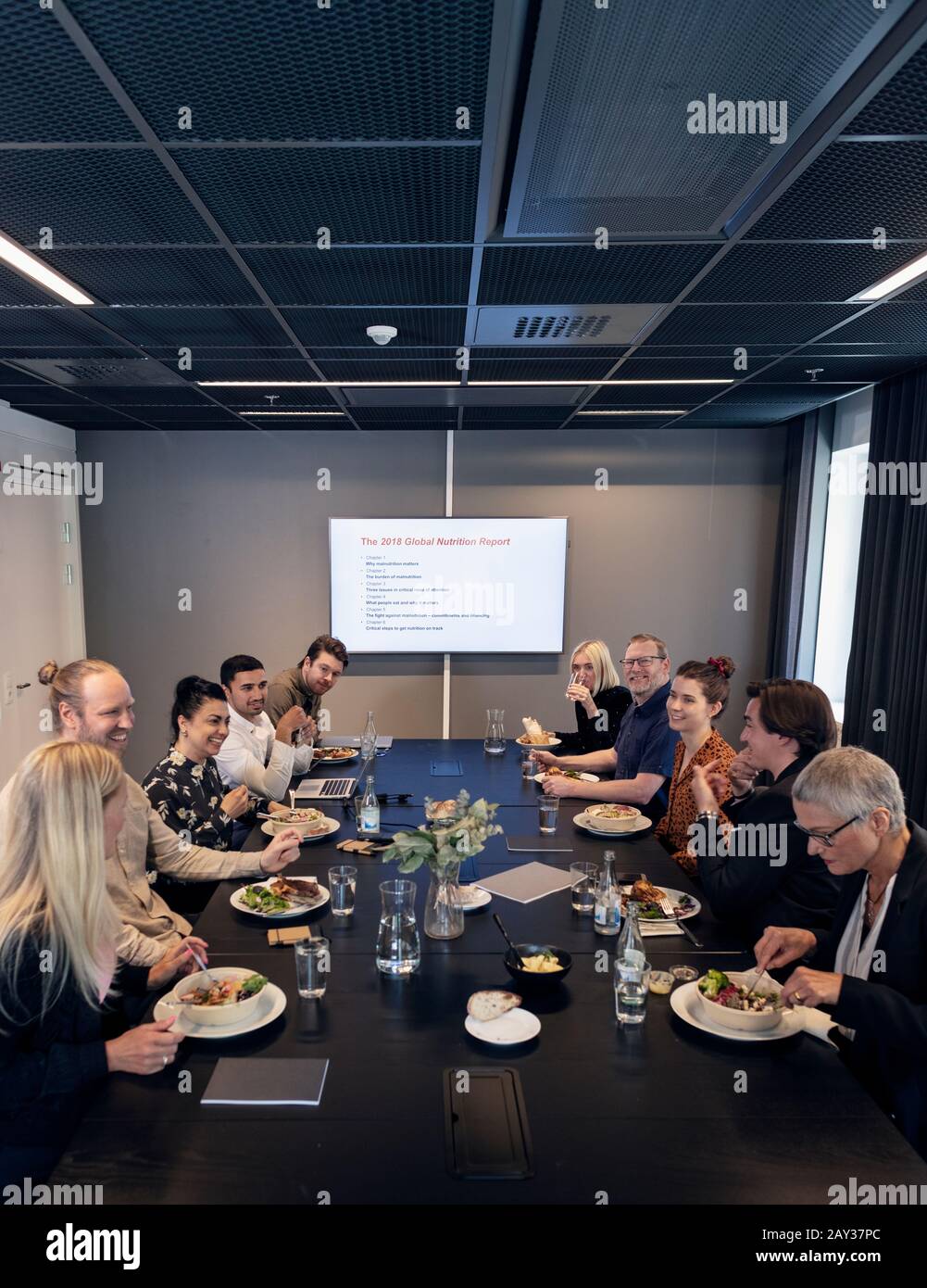 Meal during business meeting Stock Photo - Alamy
