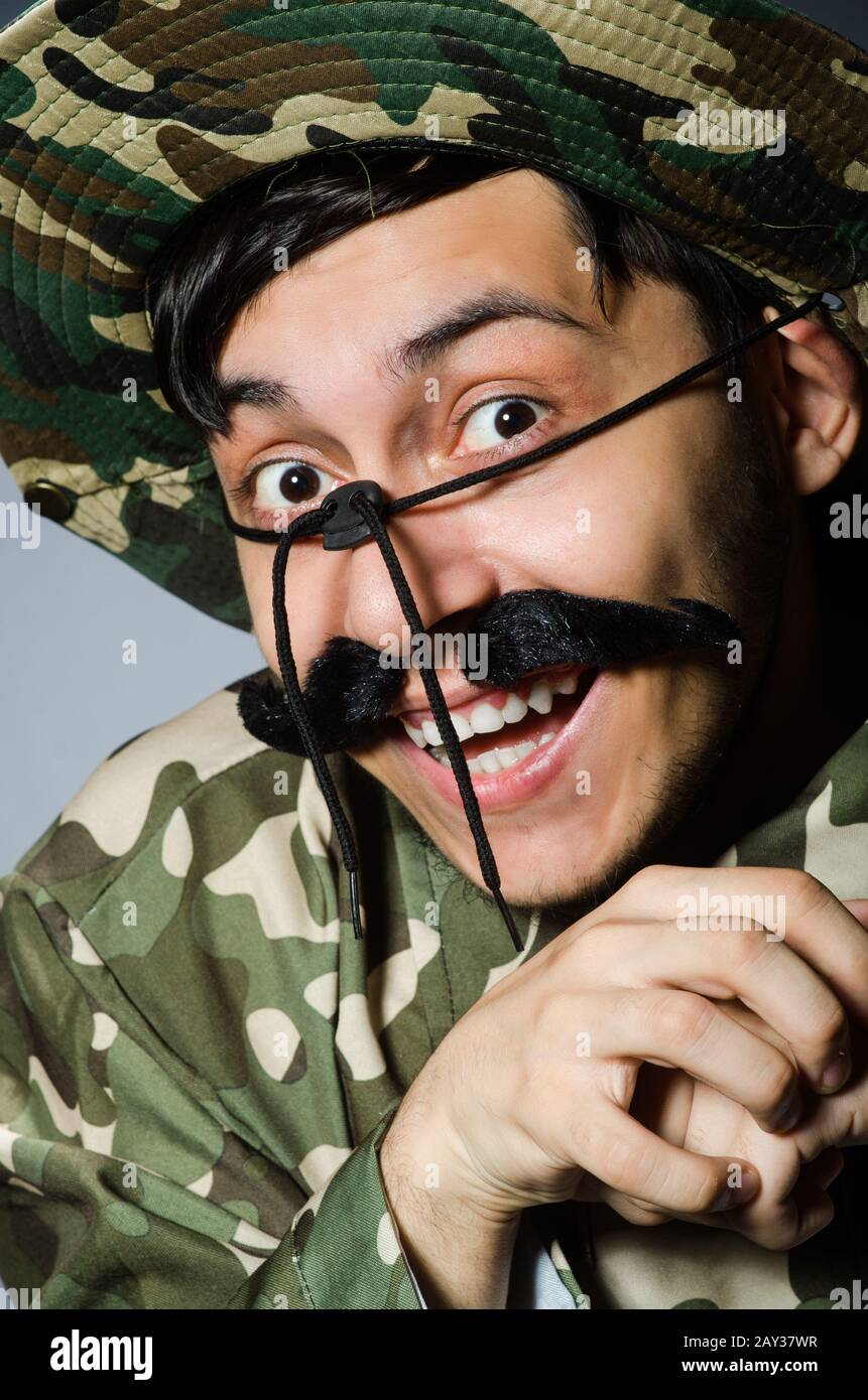 Funny soldier in military concept Stock Photo - Alamy