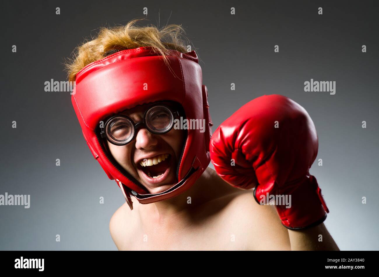 Funny boxer against dark background Stock Photo - Alamy