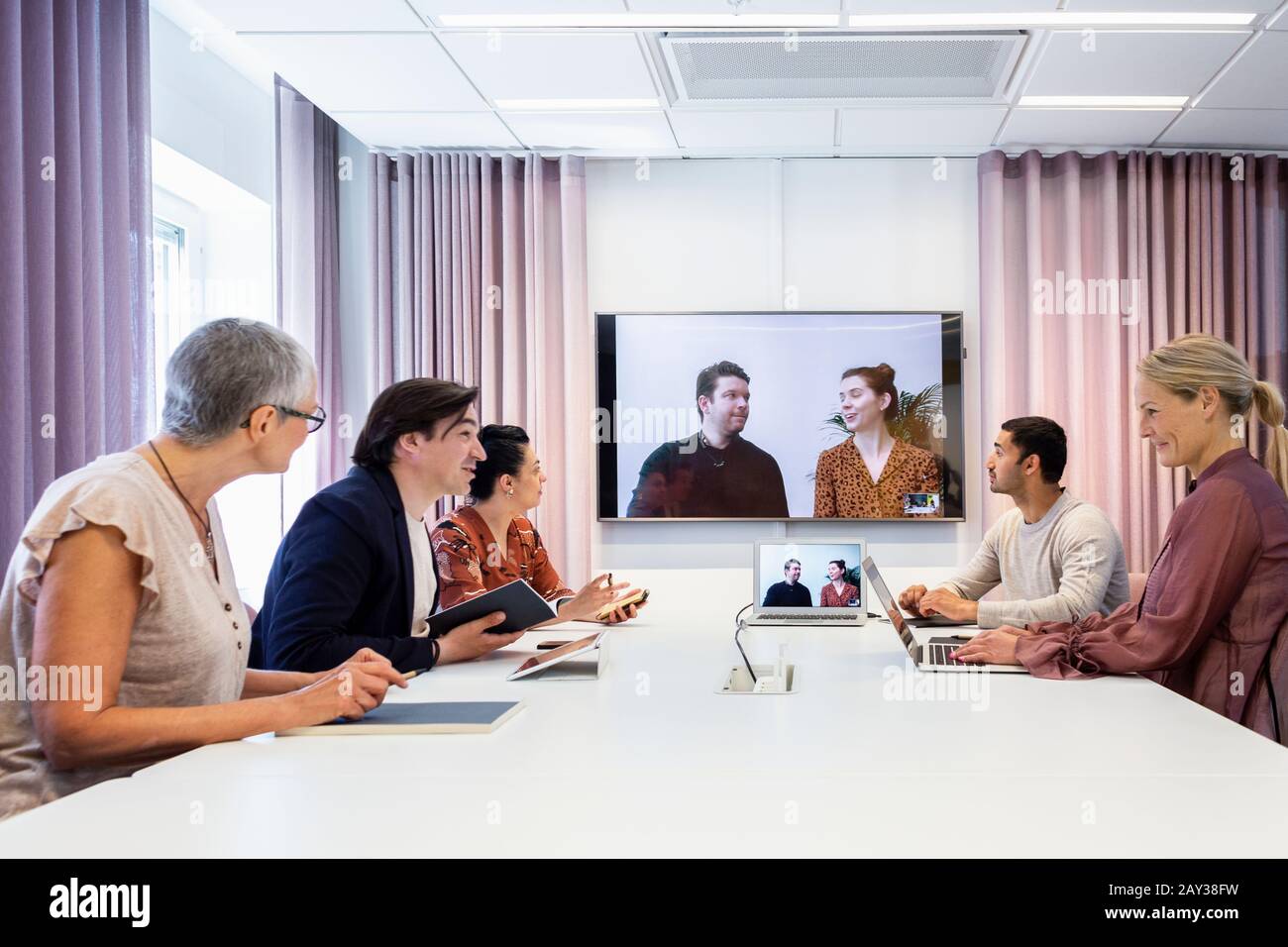 People during video conference Stock Photo - Alamy
