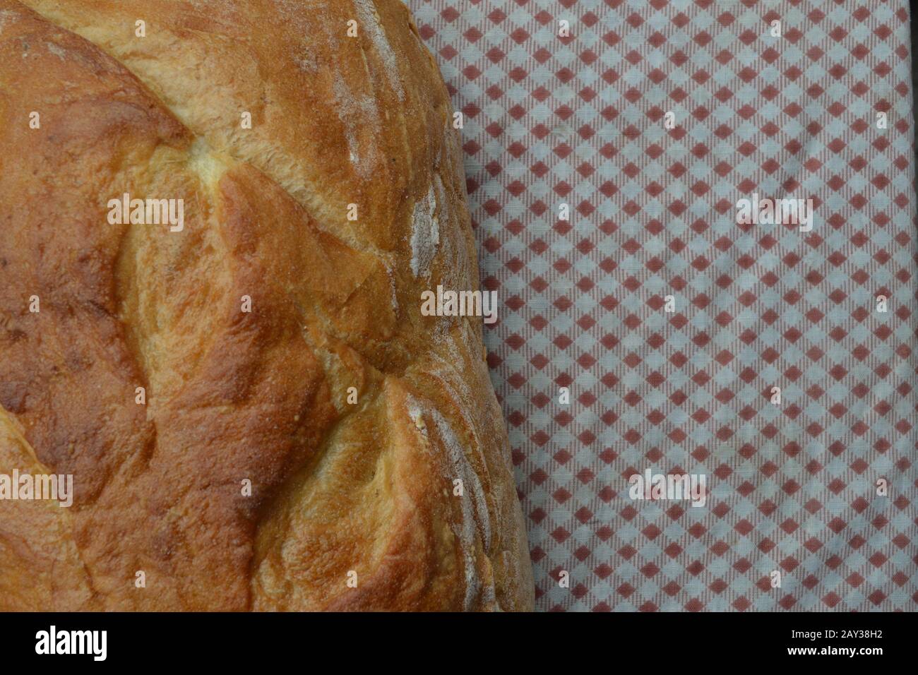 Bread. A loaf of bread. Freshly baked bread. Food. Kitchen. Tablecloth ...