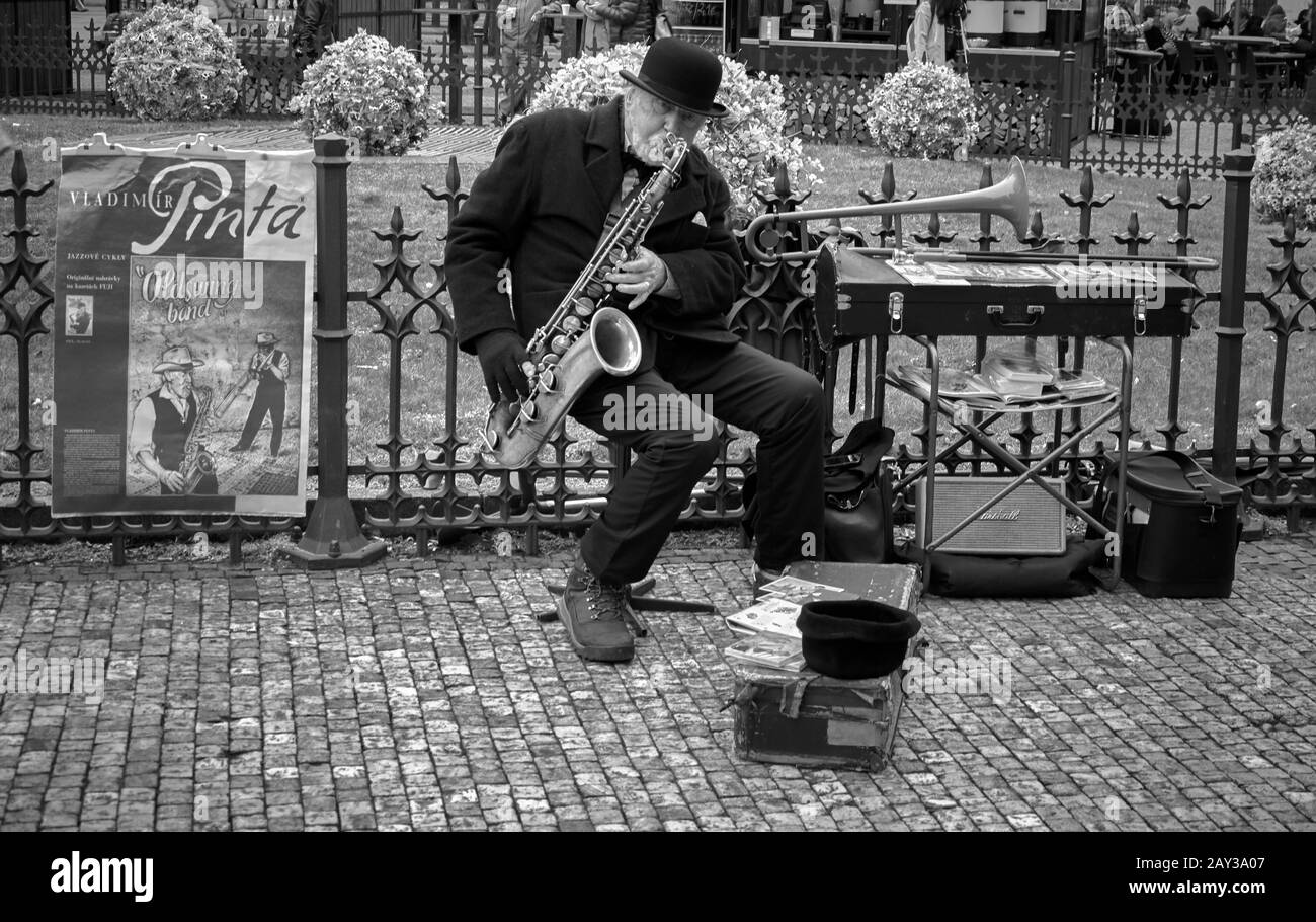 Street musician Vladimir Pinta playing saxophone in Prague, Czech ...