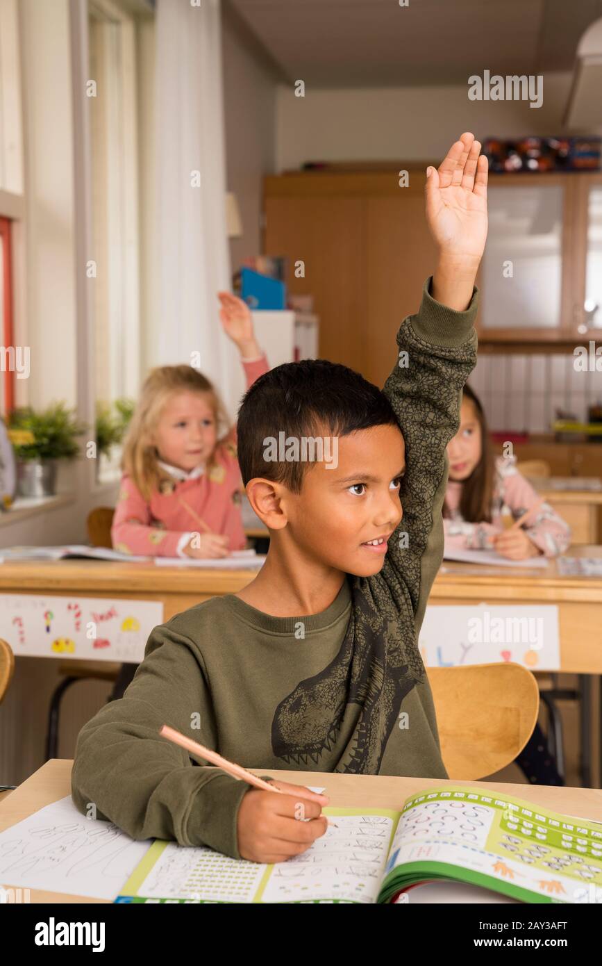 Boy in classroom Stock Photo - Alamy